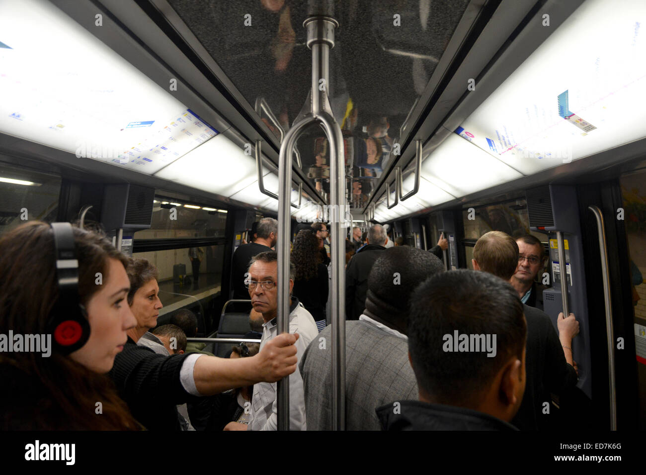 Passengers on a Paris Metro subway train. Street photography Stock ...