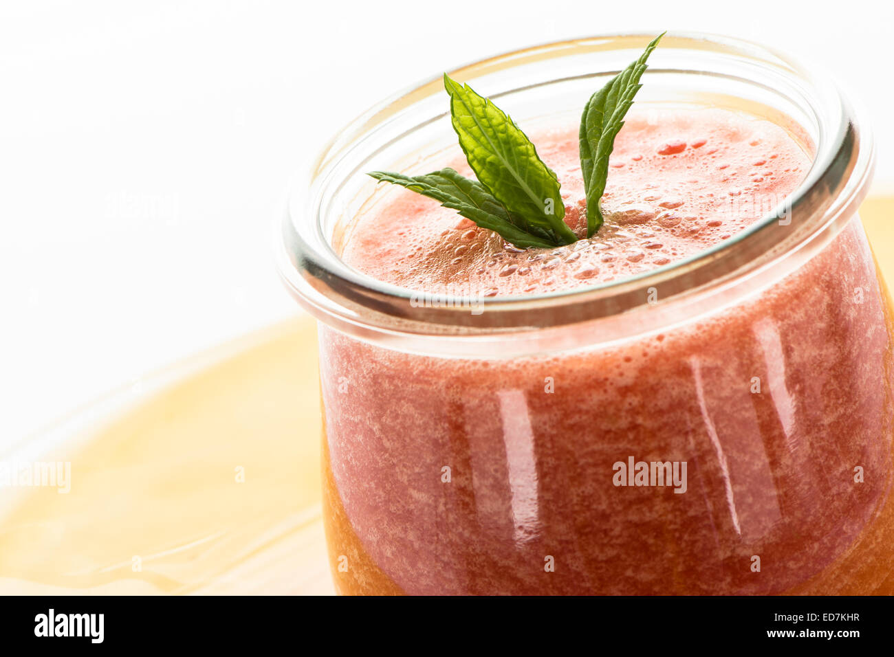 Chilled melon fruit soup with mint and mint in a glass Stock Photo - Alamy
