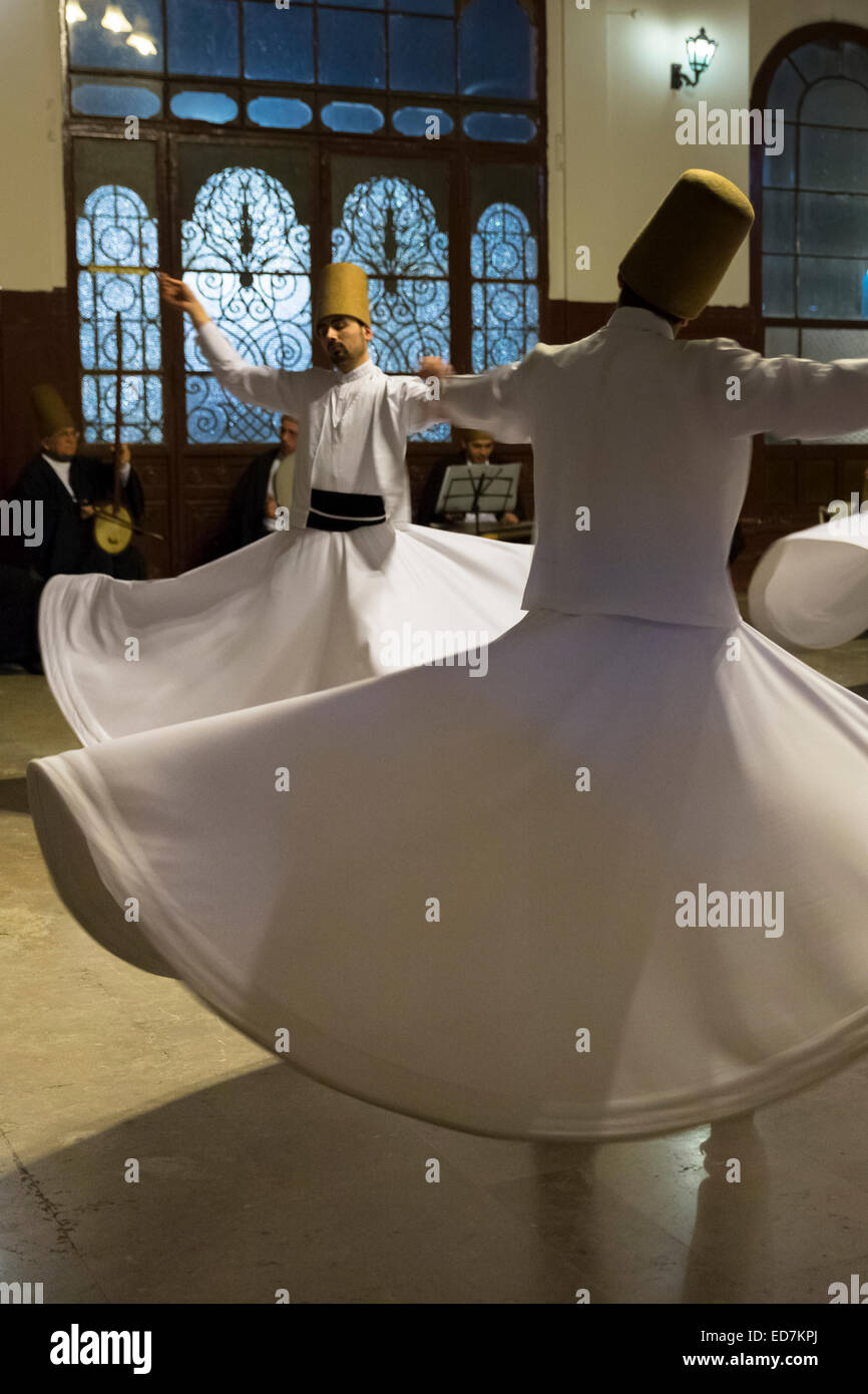 Mevlevi whirling dervishes performing hi-res stock photography and ...