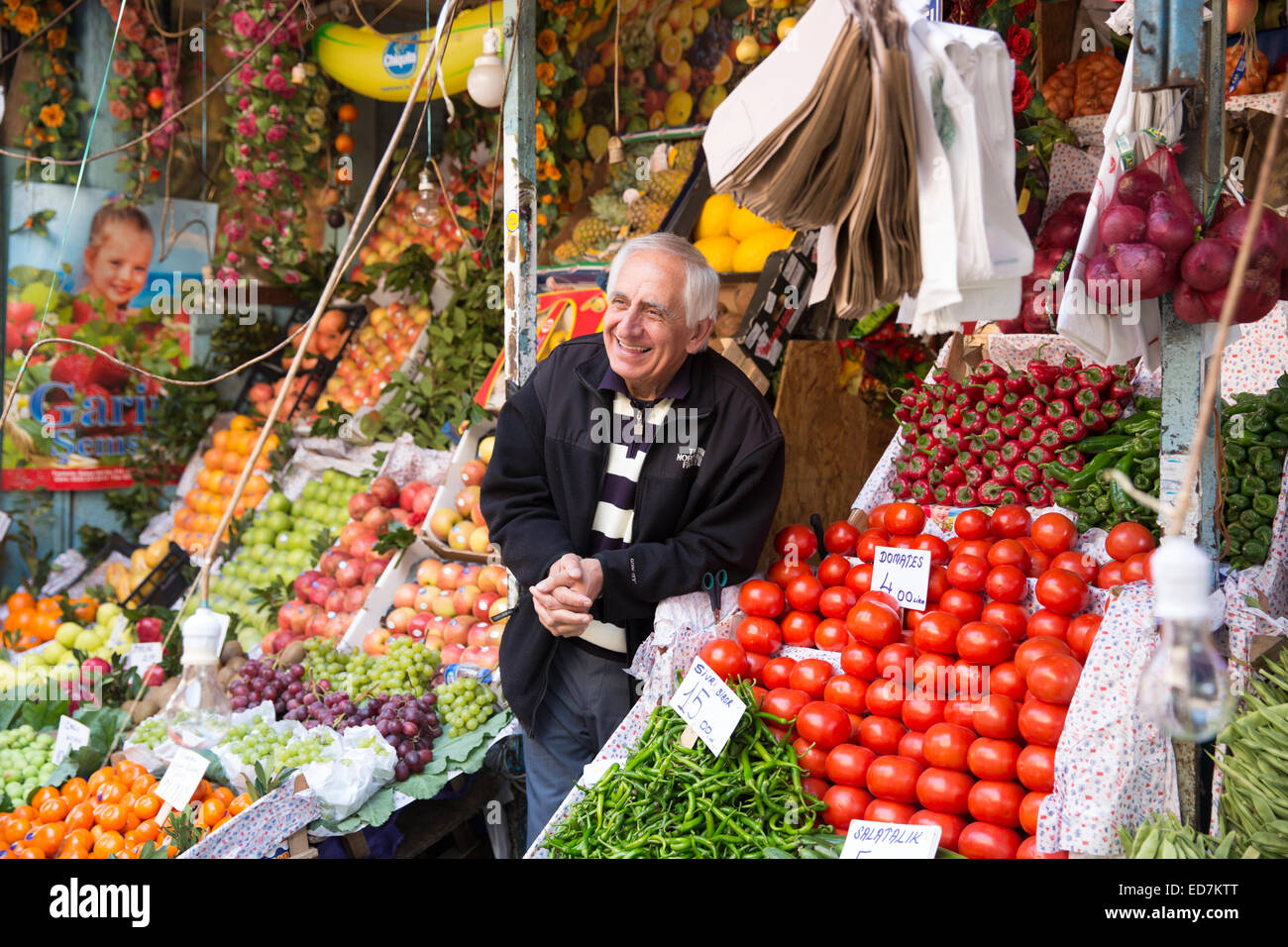 Turkish shopkeeper selling fresh vegetables on sale at food and spice ...