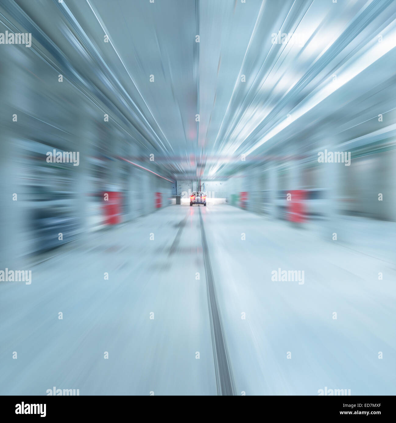 Lights of the moving fast car in the underground parking Stock Photo ...