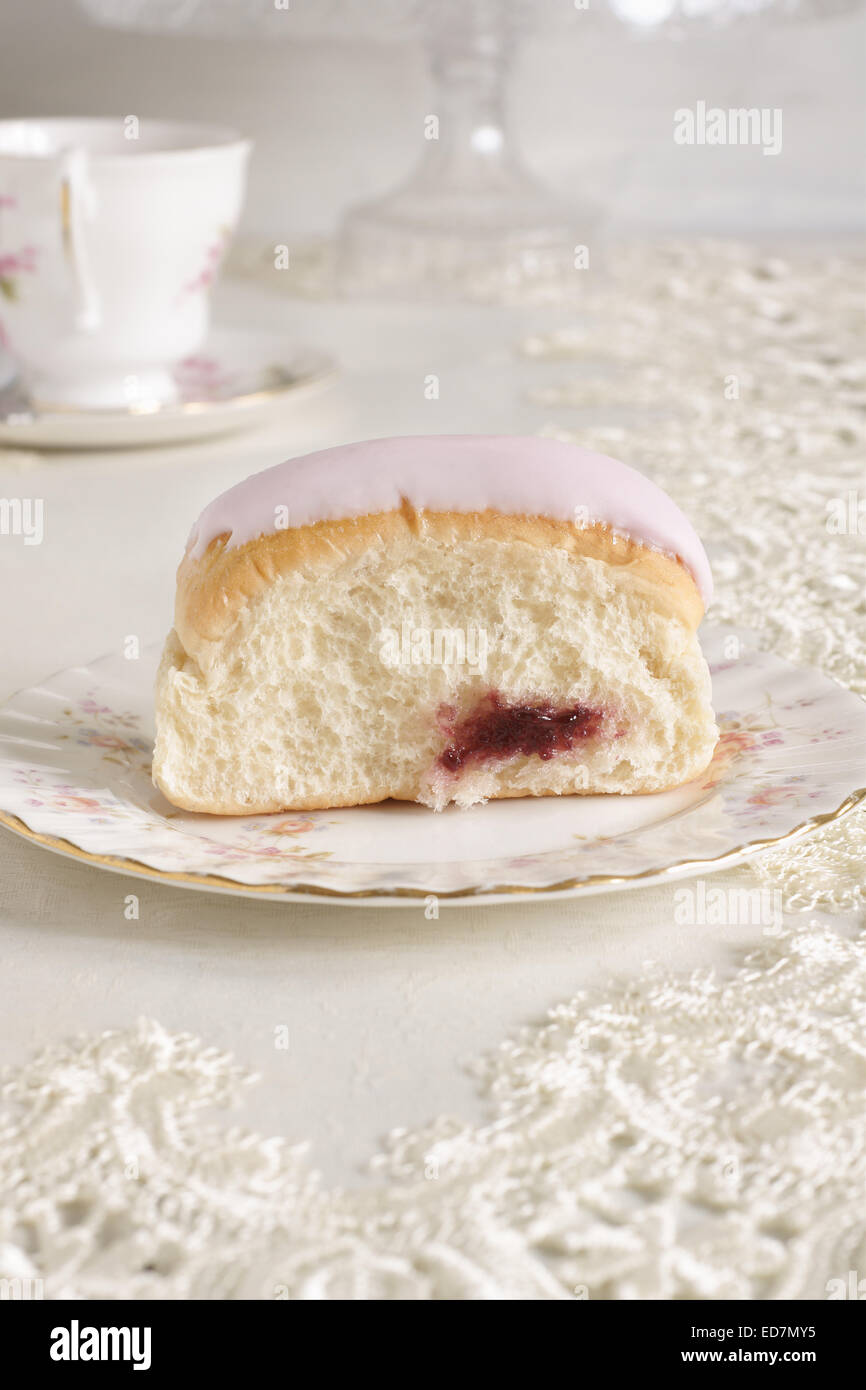 Iced buns or fingers a brioche style bun covered with pink icing Stock ...