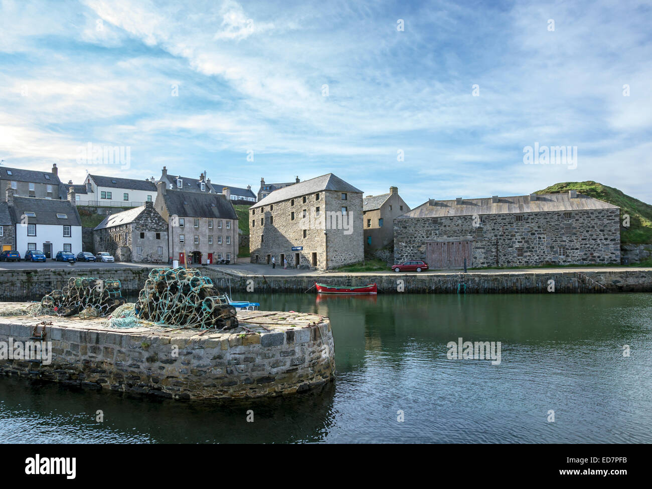 View of the old harbour in Portsoy Scotland with the old harbourside ...