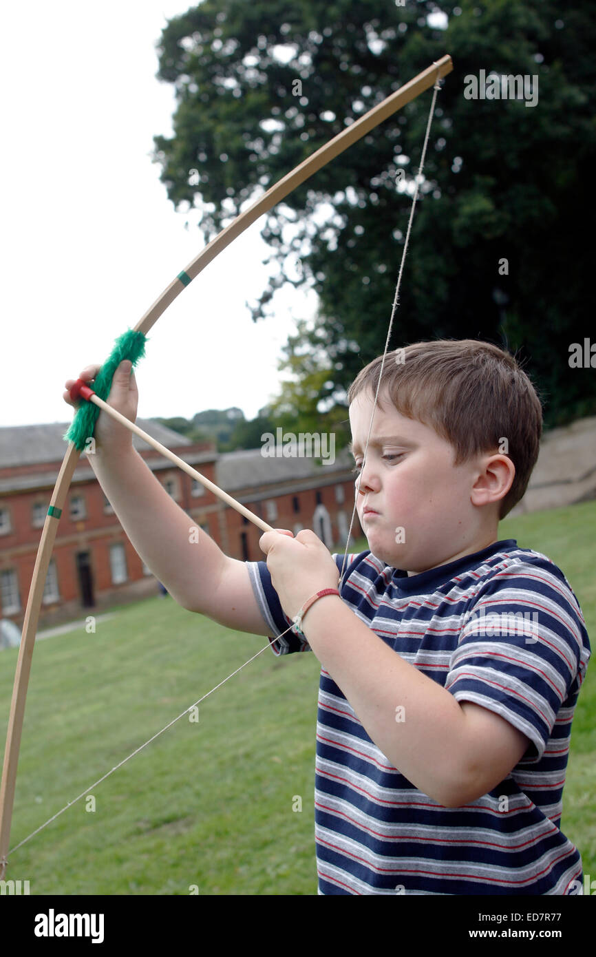 Boy with bow hi-res stock photography and images - Alamy