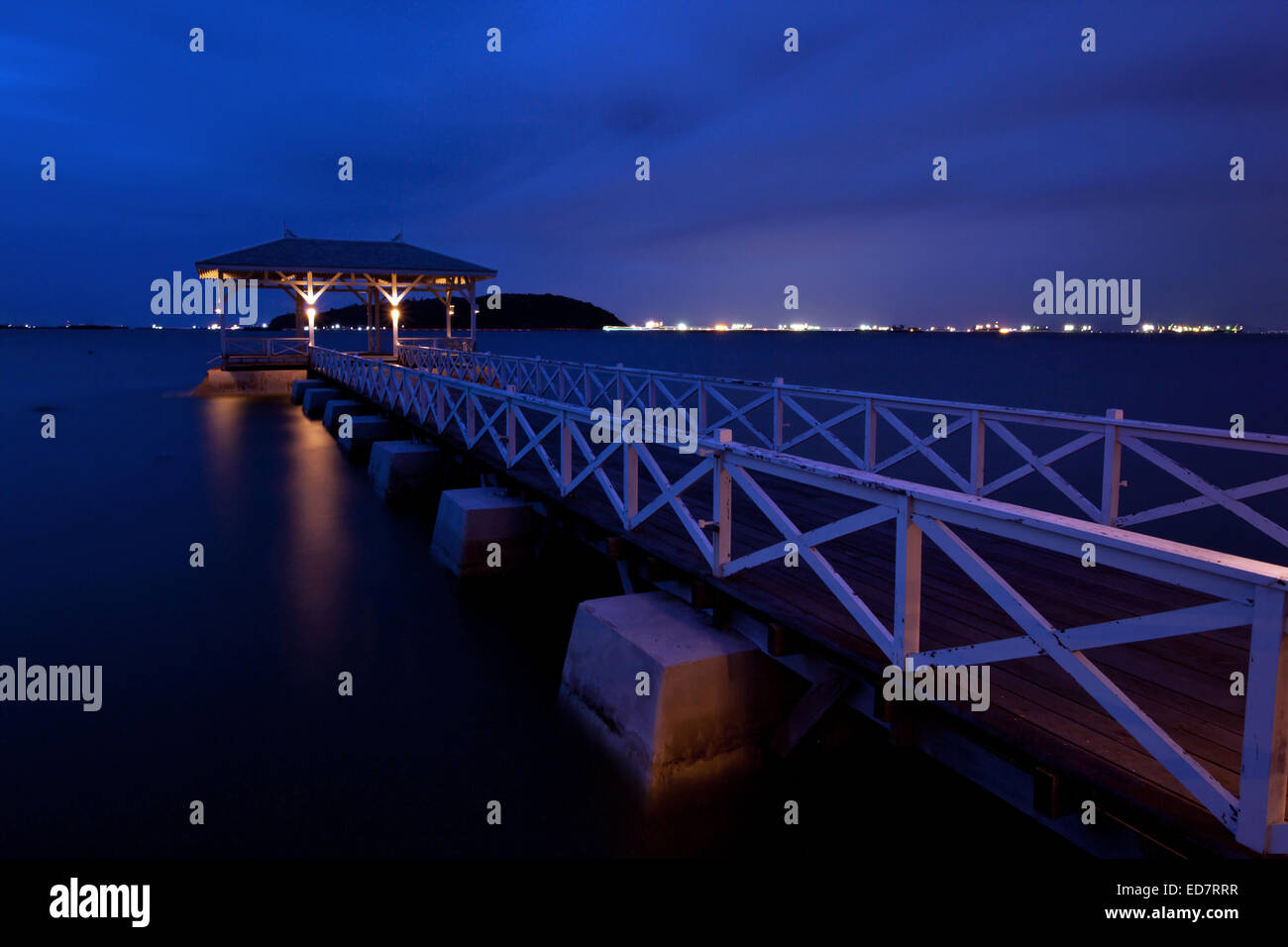 pavillion at end of wooden jetty walkway at dusk Stock Photo - Alamy
