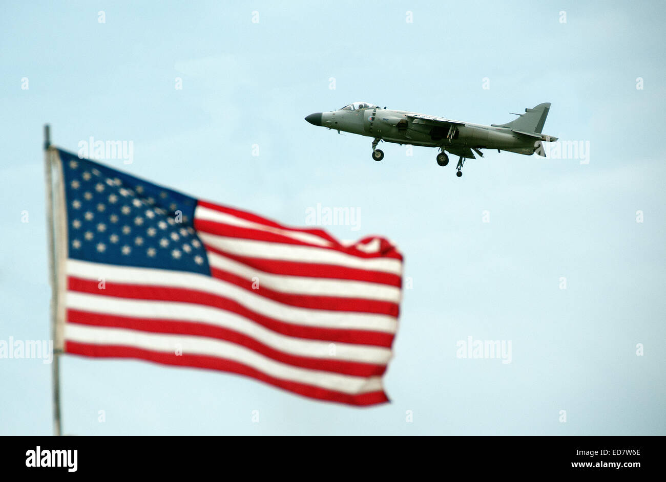 British Harrier jet saluting American flag at Airshow Stock Photo - Alamy