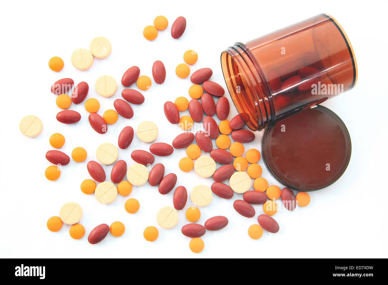 isolated top Persepctive of Open pill bottle with medicine spilling out ...