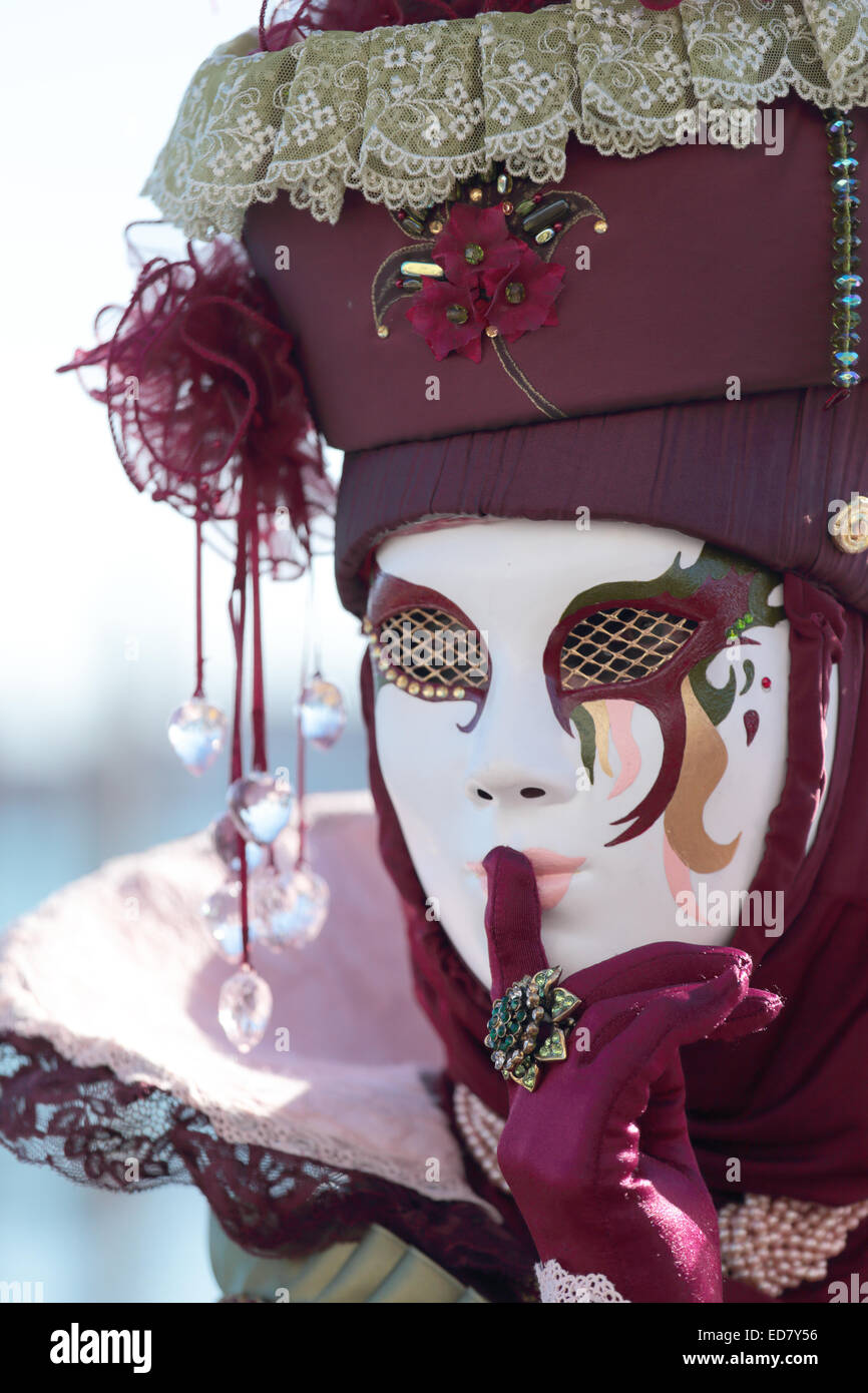 A masked lady hushing exhibited during the traditional festival of ...