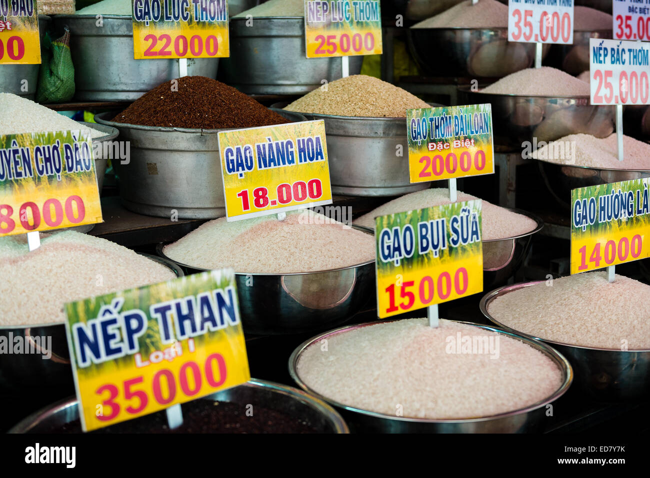 Rice for sale at street market in Saigon Stock Photo - Alamy