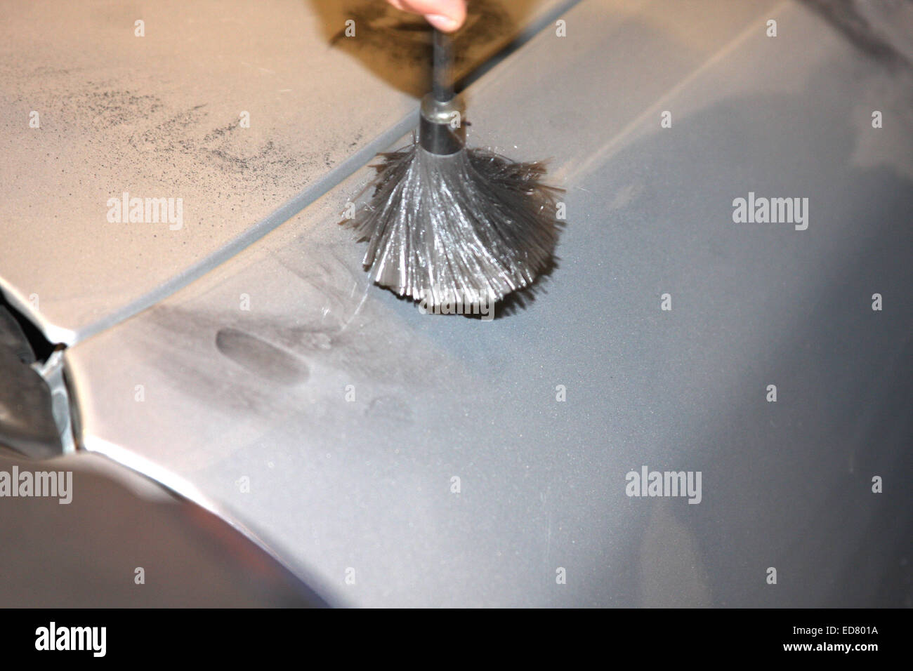 A fingerprint brush and dust reveiling a fingerpint on a car Stock ...