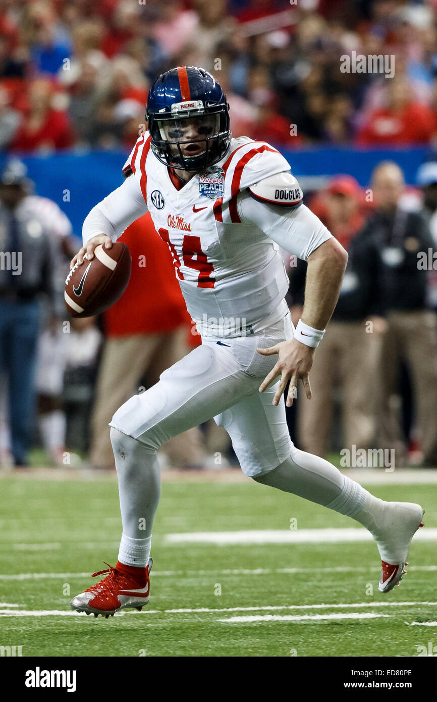 December 31, 2104: Ole Miss Rebels quarterback Bo Wallace (14) looks to ...