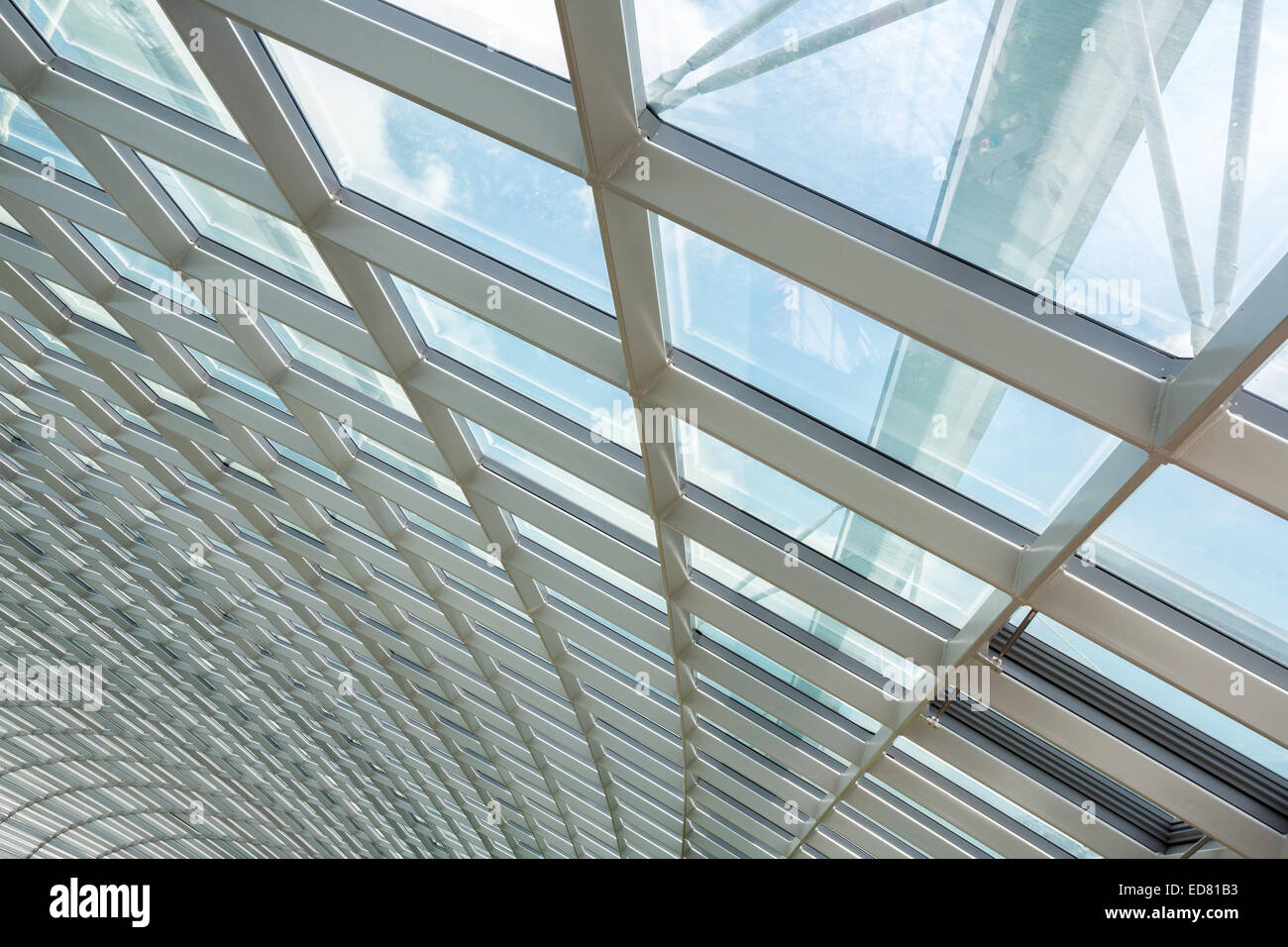 interior of office building with metal and glass roof Stock Photo - Alamy