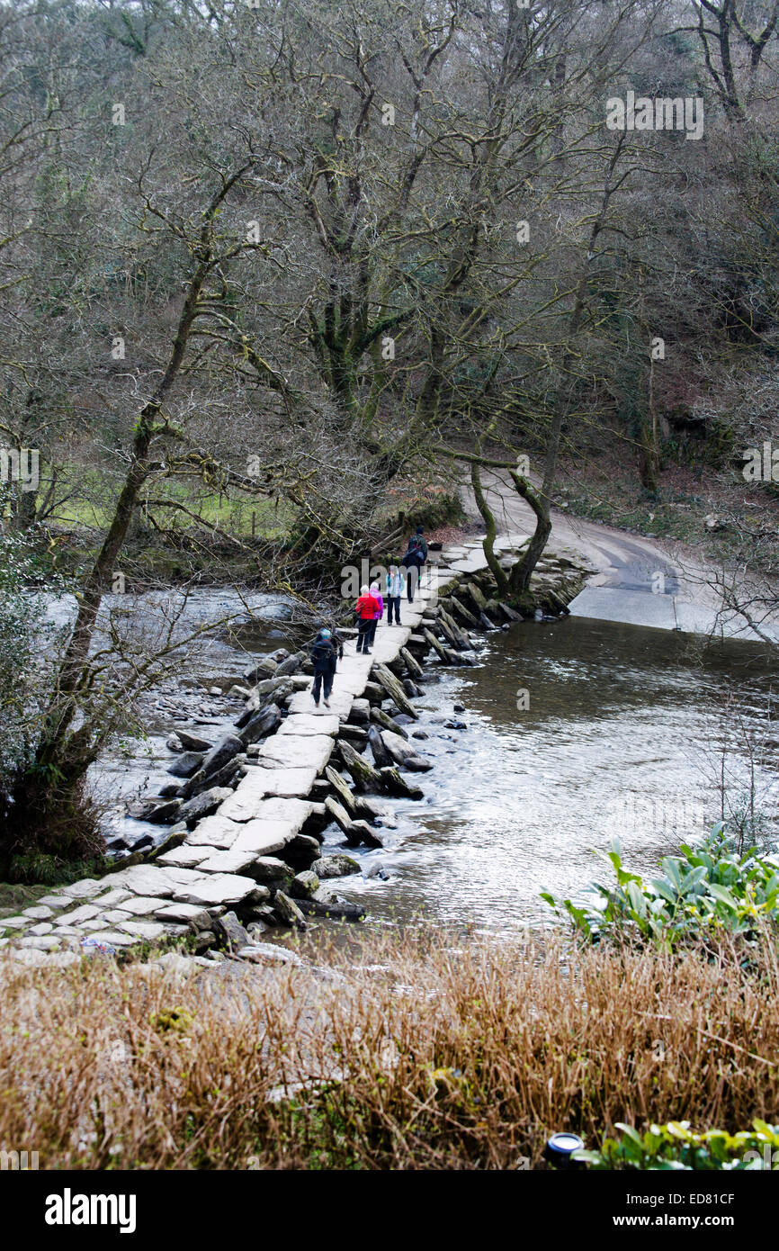 Tarr Steps, an ancient clapper bridge across the River Barle in the ...