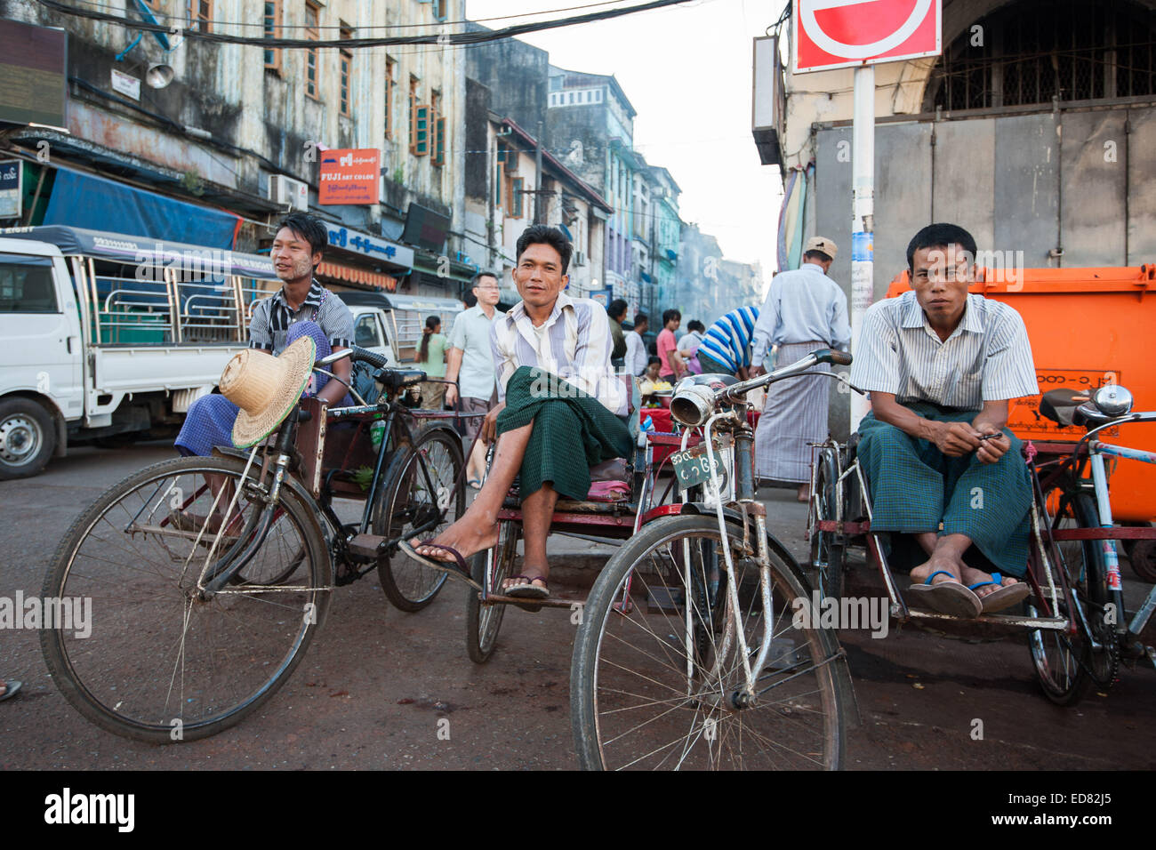 Men with rickshaw cycles resting - Yangon, Myanmar Stock Photo - Alamy