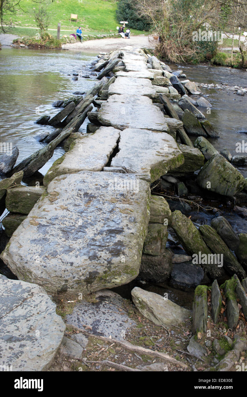 Tarr Steps, an ancient clapper bridge across the River Barle in the ...