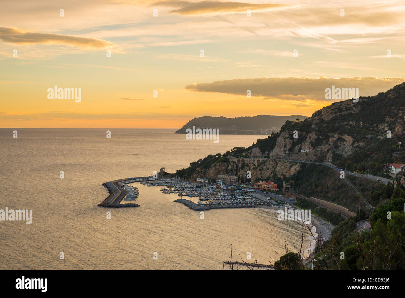 The dramatic rocky coastline in Liguria, Italy, with a small bay and ...