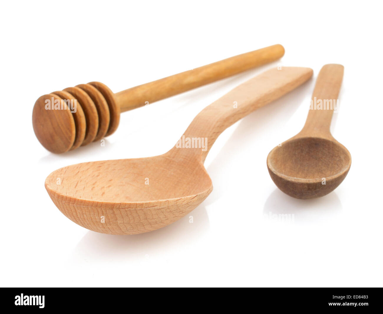 wooden spoon and stick isolated on white background Stock Photo - Alamy