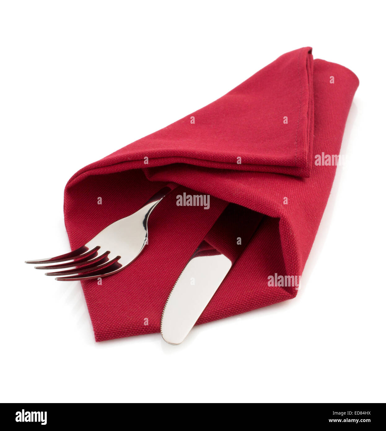 knife and fork at napkin isolated on white background Stock Photo - Alamy