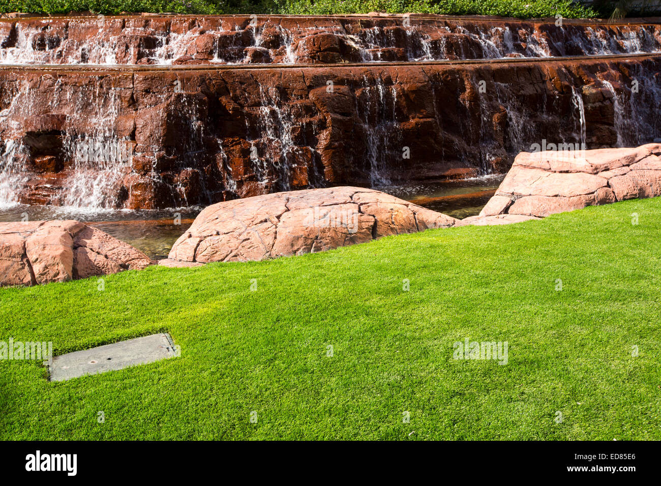 Plastic gras and a waterfall in Las Vegas, Nevada, USA, probably the ...
