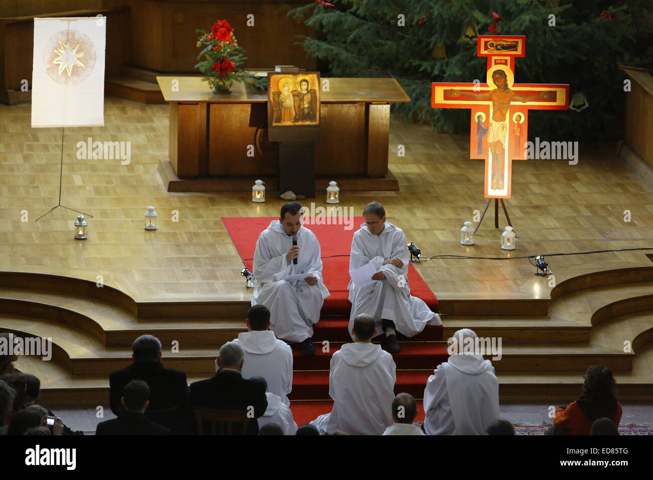 Two brothers from Taizé read a short meditation during the midday ...
