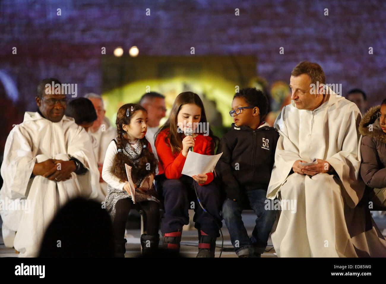A young girl reads the end of the meditation of Brother Alois (right ...