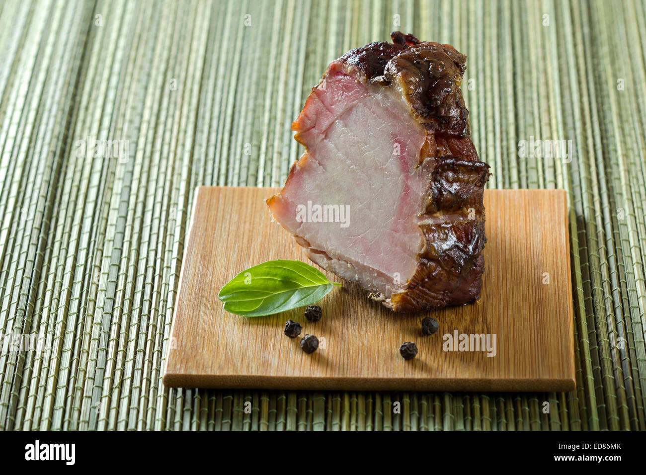 Traditional Ham over bamboo with peppercorns Stock Photo - Alamy
