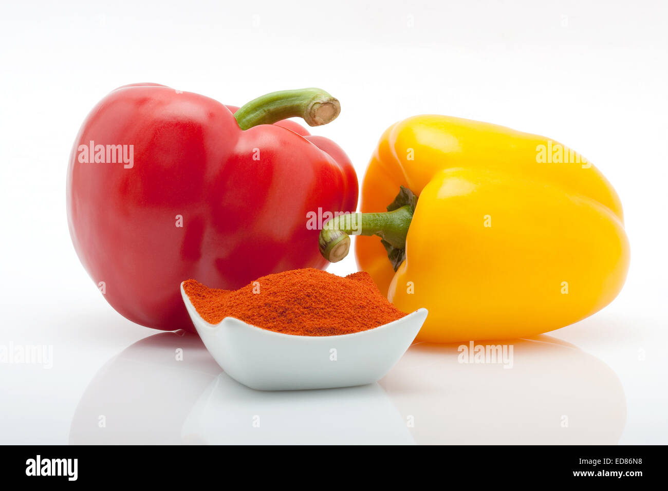 close-up of red and orange peppers isolated on white background Stock ...