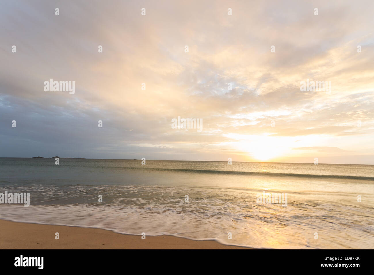 Long exposure shot at sunset from a tropical desert beach during ...