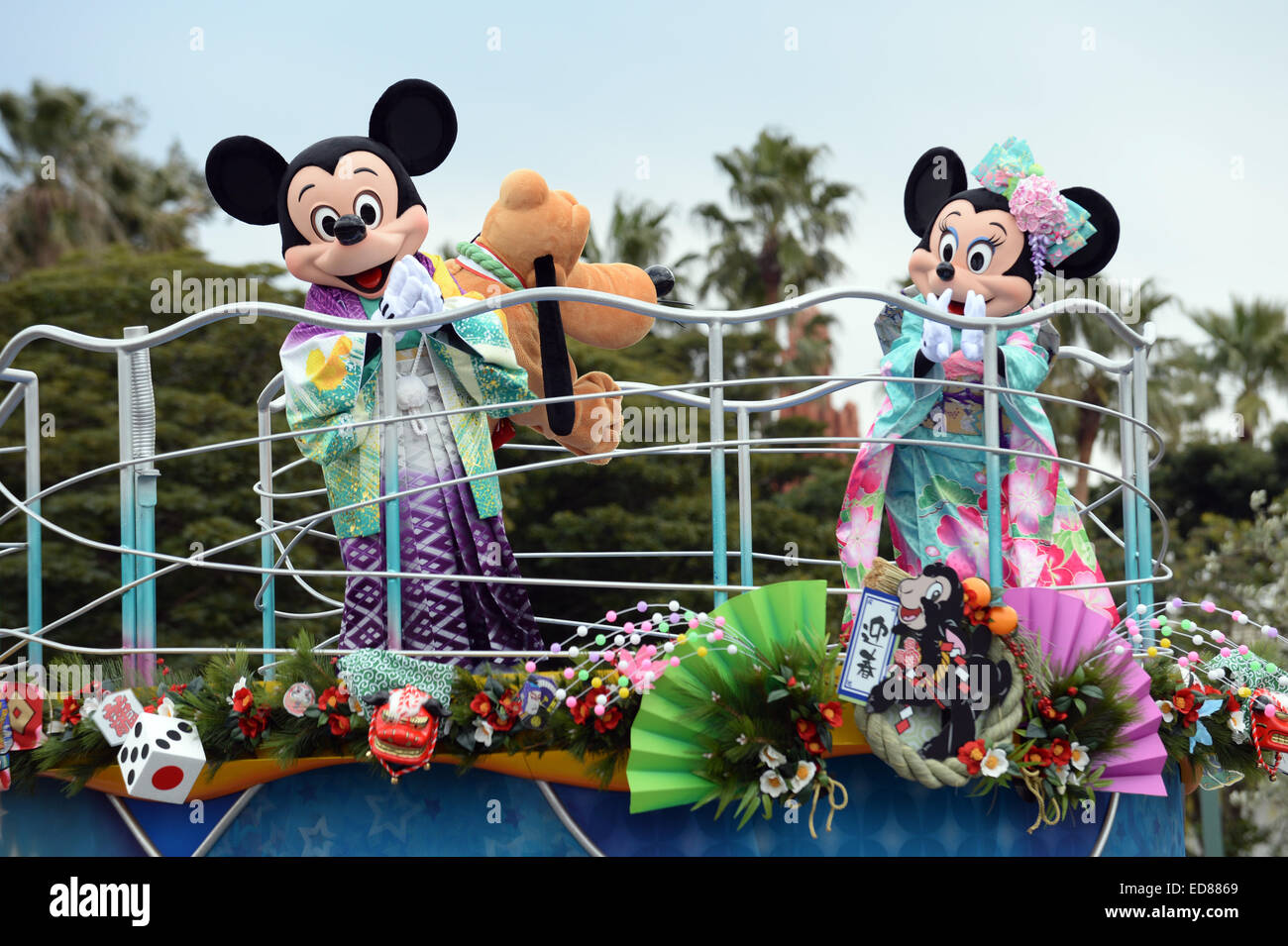 Tokyo. 1st Jan, 2015. Disney characters wave to guests on a float ...