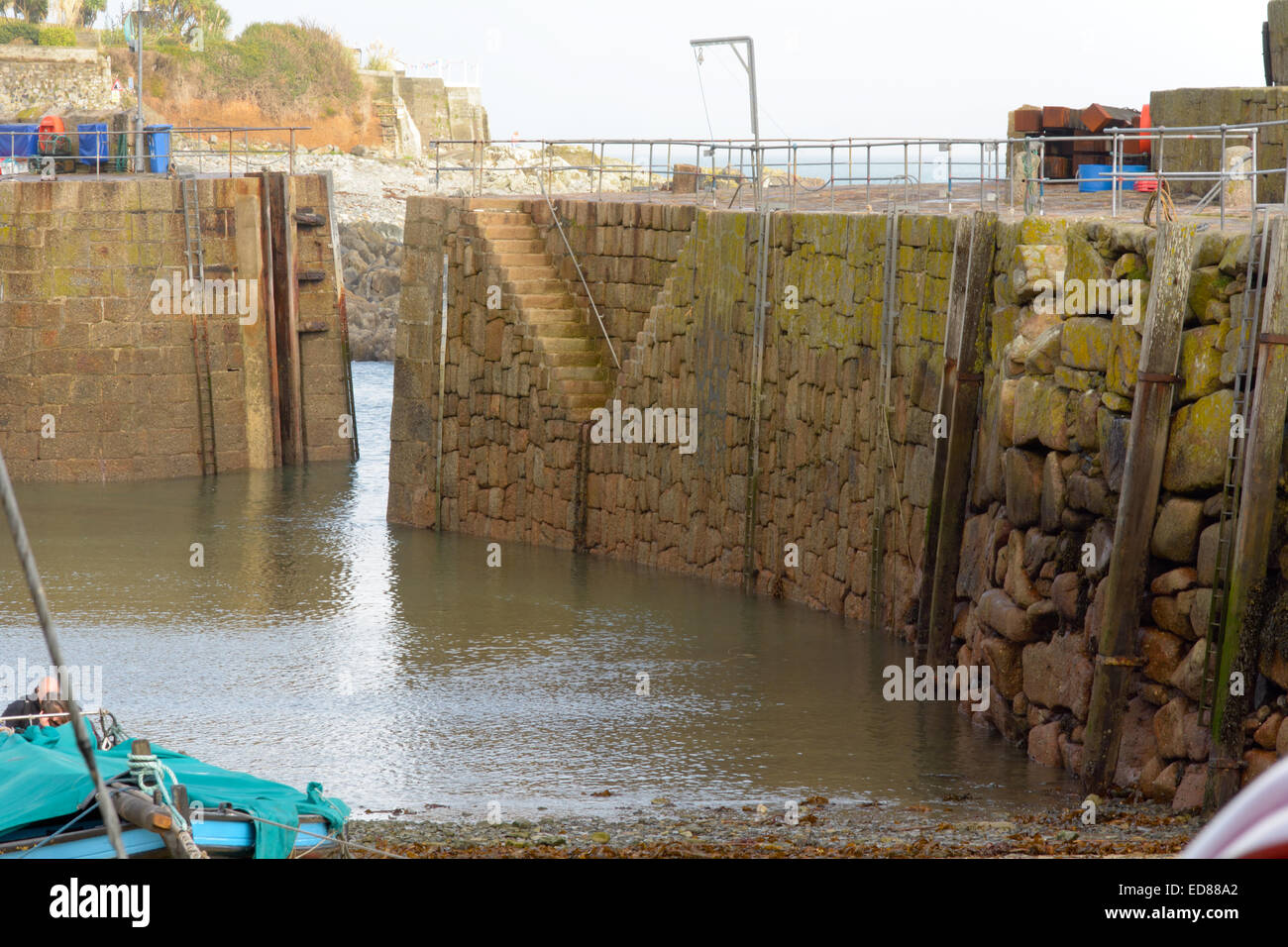 Mousehole harbour wall and entrance to port, Cornwall, England Stock ...