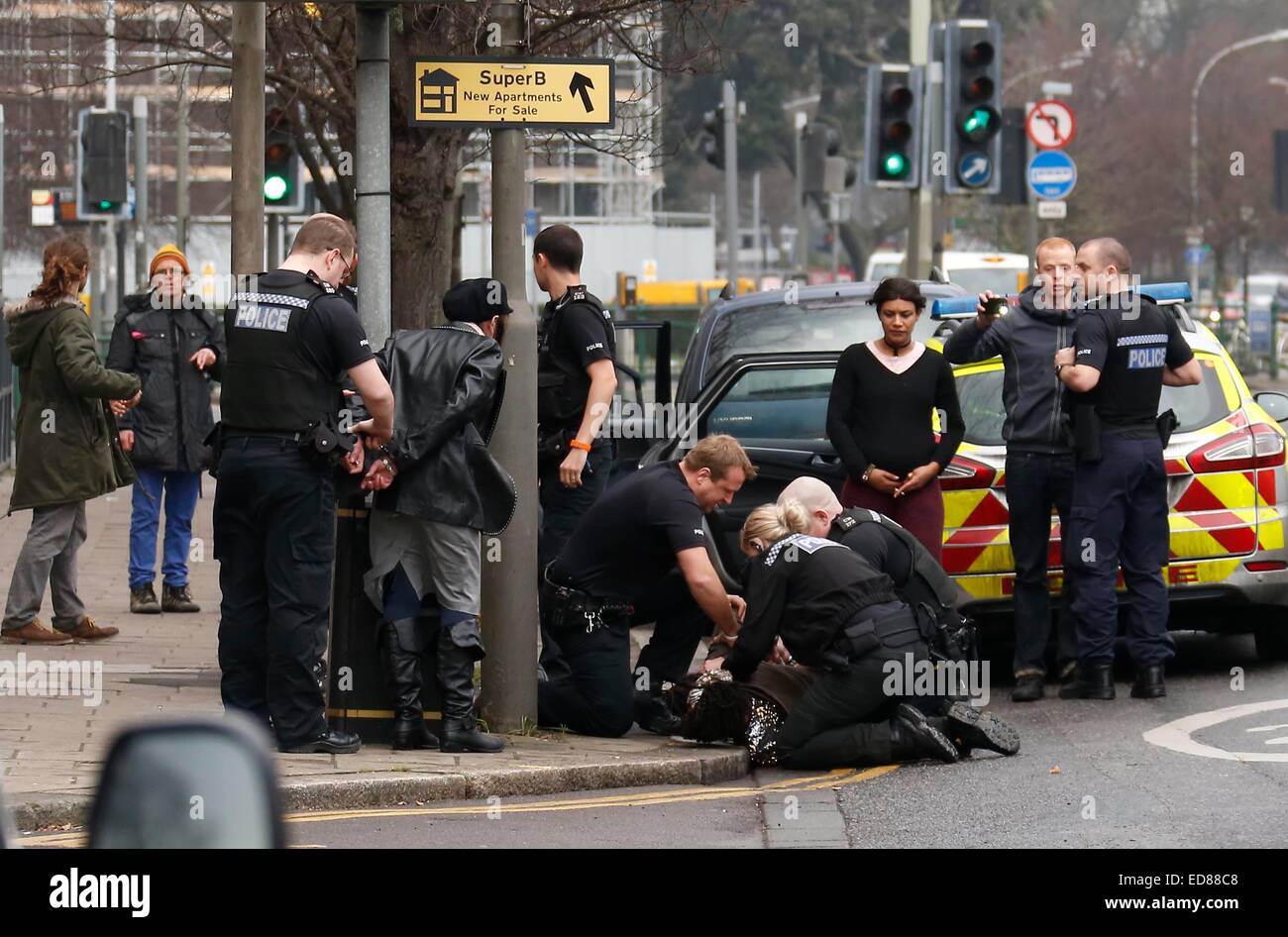 A Woman Is Restrained And Arrested By Police For Being Drunk And 3078