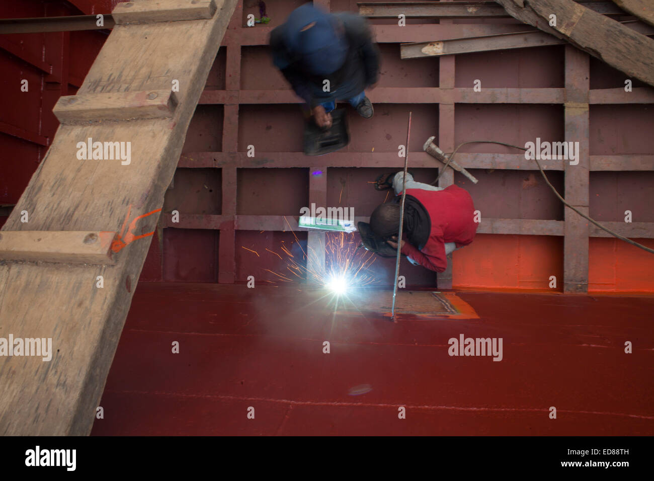Shipyard workers near the Buriganga River in Dhaka.There are more than ...