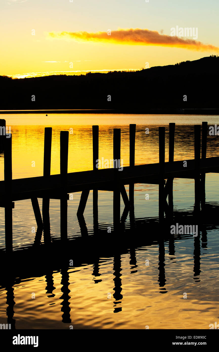 Reflections on Lake Windermere at sunset, Lake District, UK Stock Photo ...