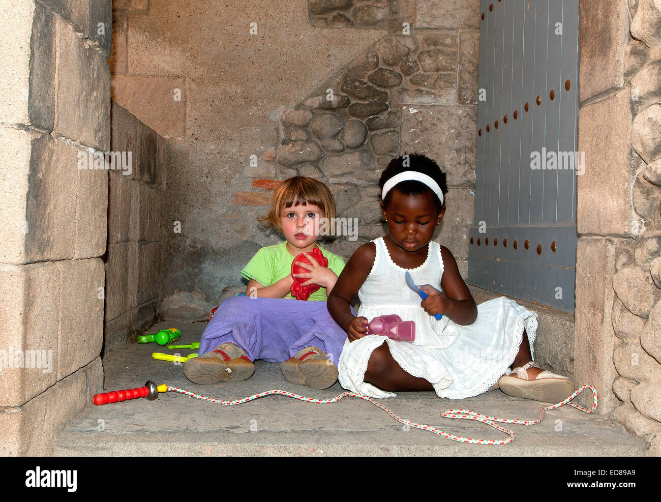 Children playing in the Spanish Village, Barcelona, Spain Stock Photo ...