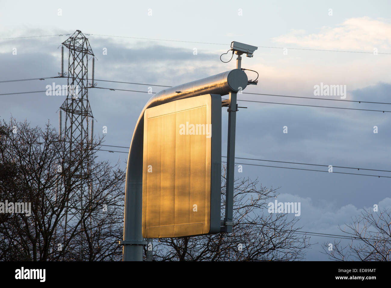 An electronic information board and CCTV camera on the M6 motorway in ...