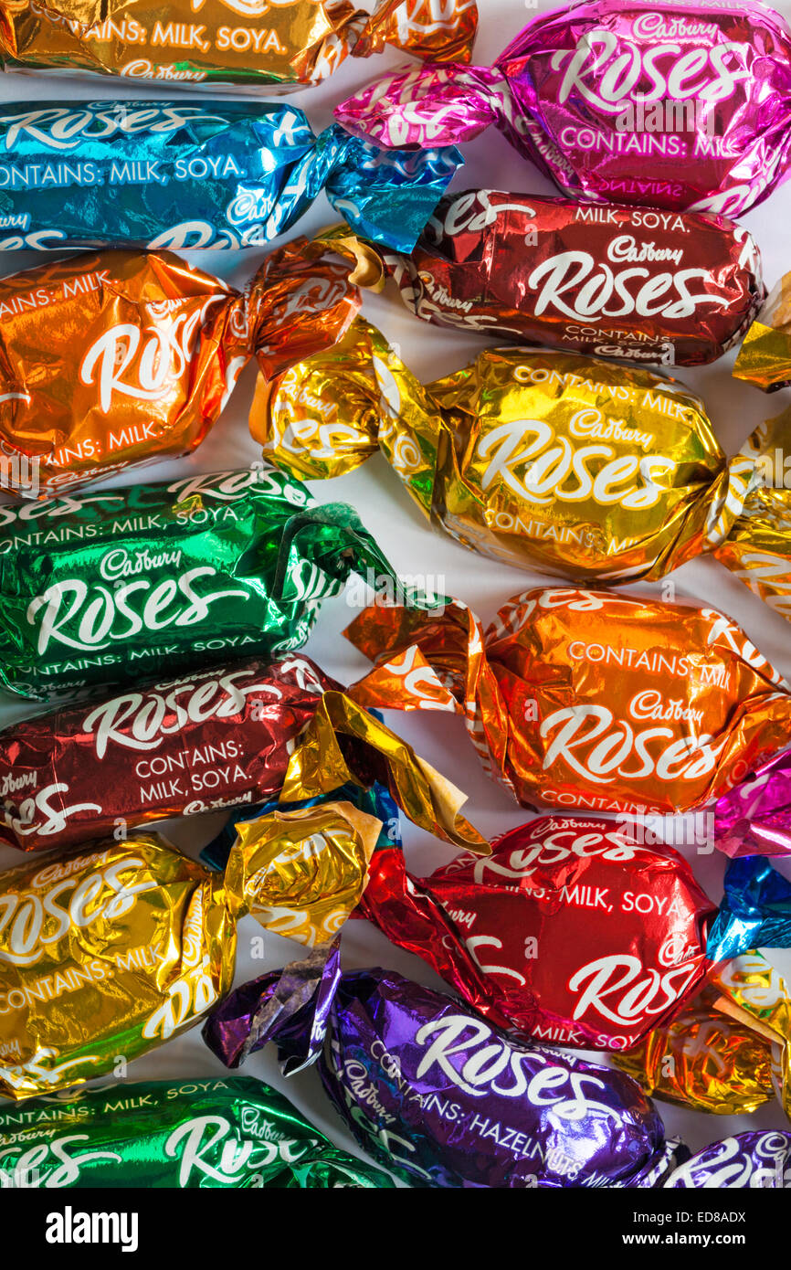 spread of Cadbury Roses chocolates removed from open box Cadburys Roses selection Stock Photo Alamy