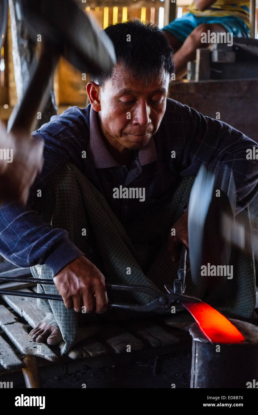 Blacksmith in village at Inle Lake, Shan-State, Myanmar, Asia Stock ...