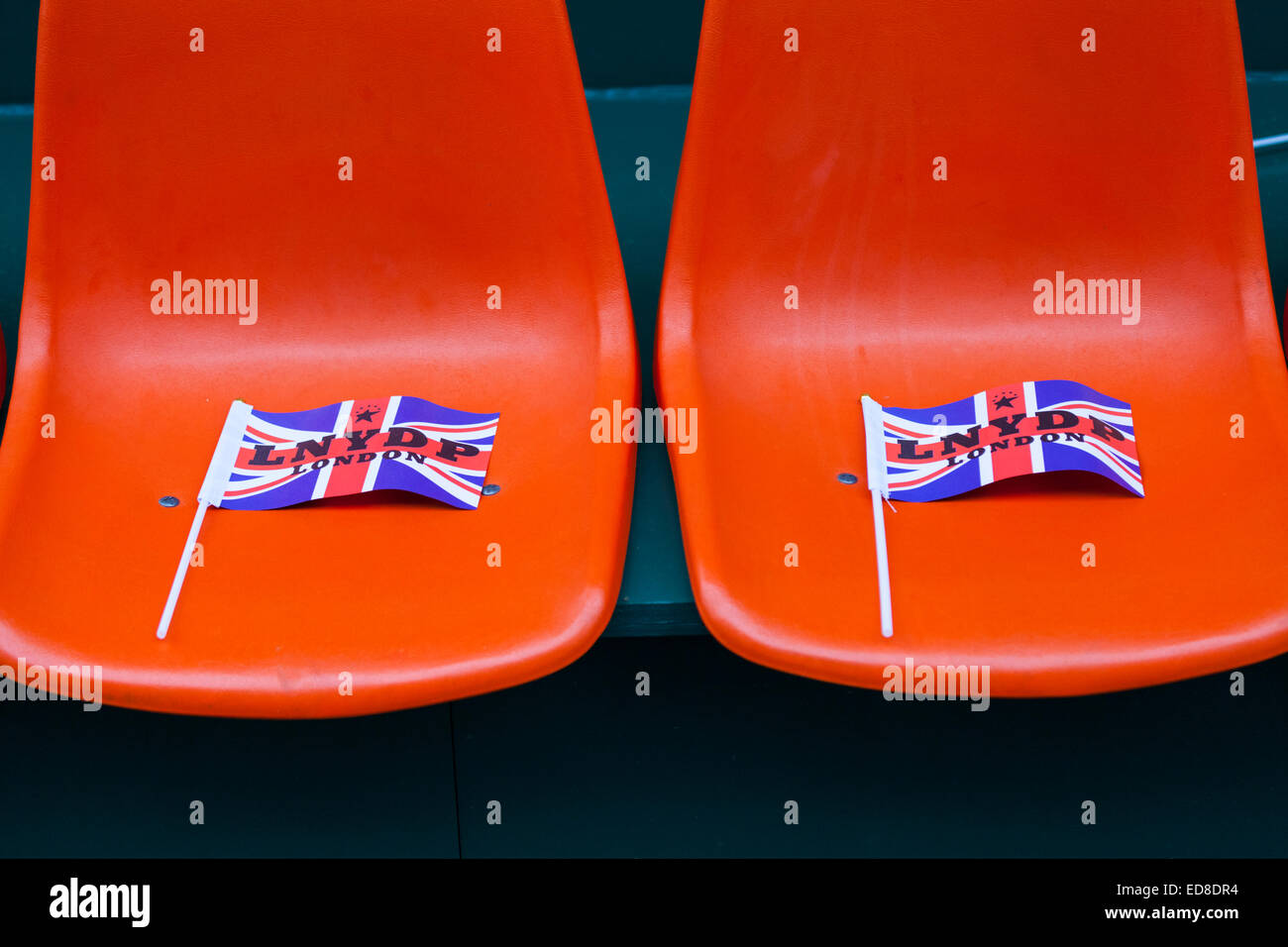 Union Jack flags with LNYDP logo mark reserved seats on a spectator ...