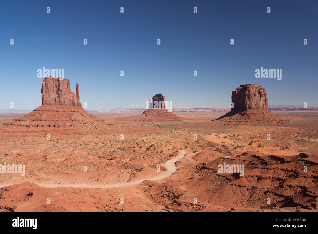 USA, Utah, Monument Valley, West and East Mitten Buttes (left) and ...