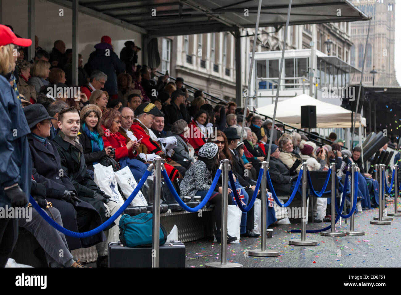 Spectators on the VIP Grandstand in Whitehall watch the London New Year ...