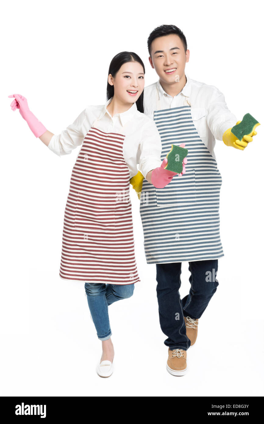 couple hold cleaning tool on white background Stock Photo - Alamy