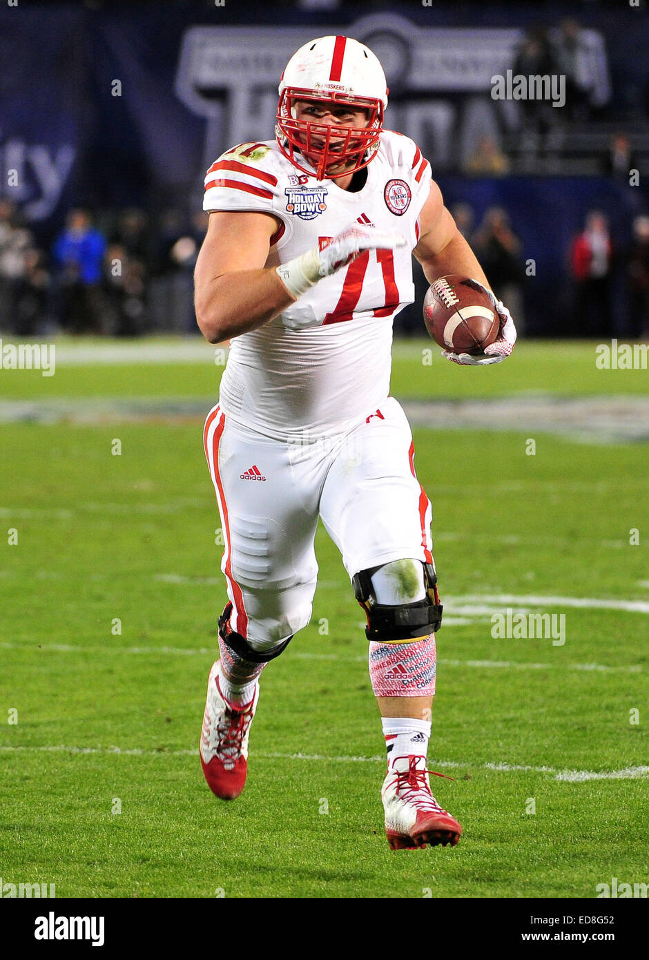 San Diego, CA. 27th Dec, 2014. Offensive lineman Alex Lewis #71 catches ...