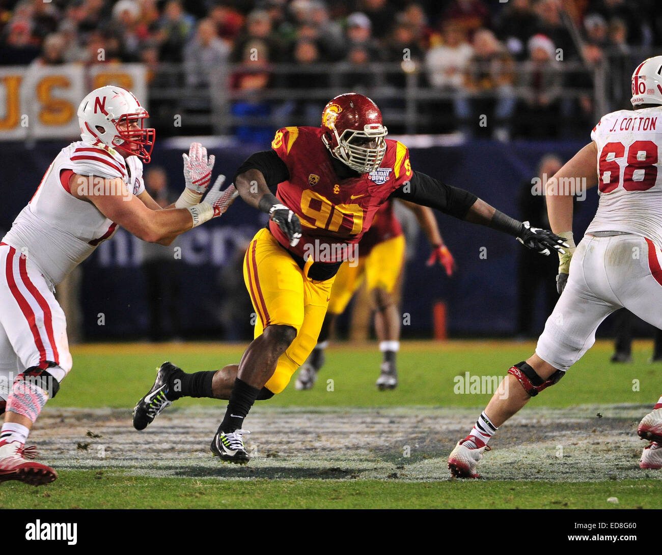 San Diego, CA. 27th Dec, 2014. Claude Pelon #90 of USC during the ...