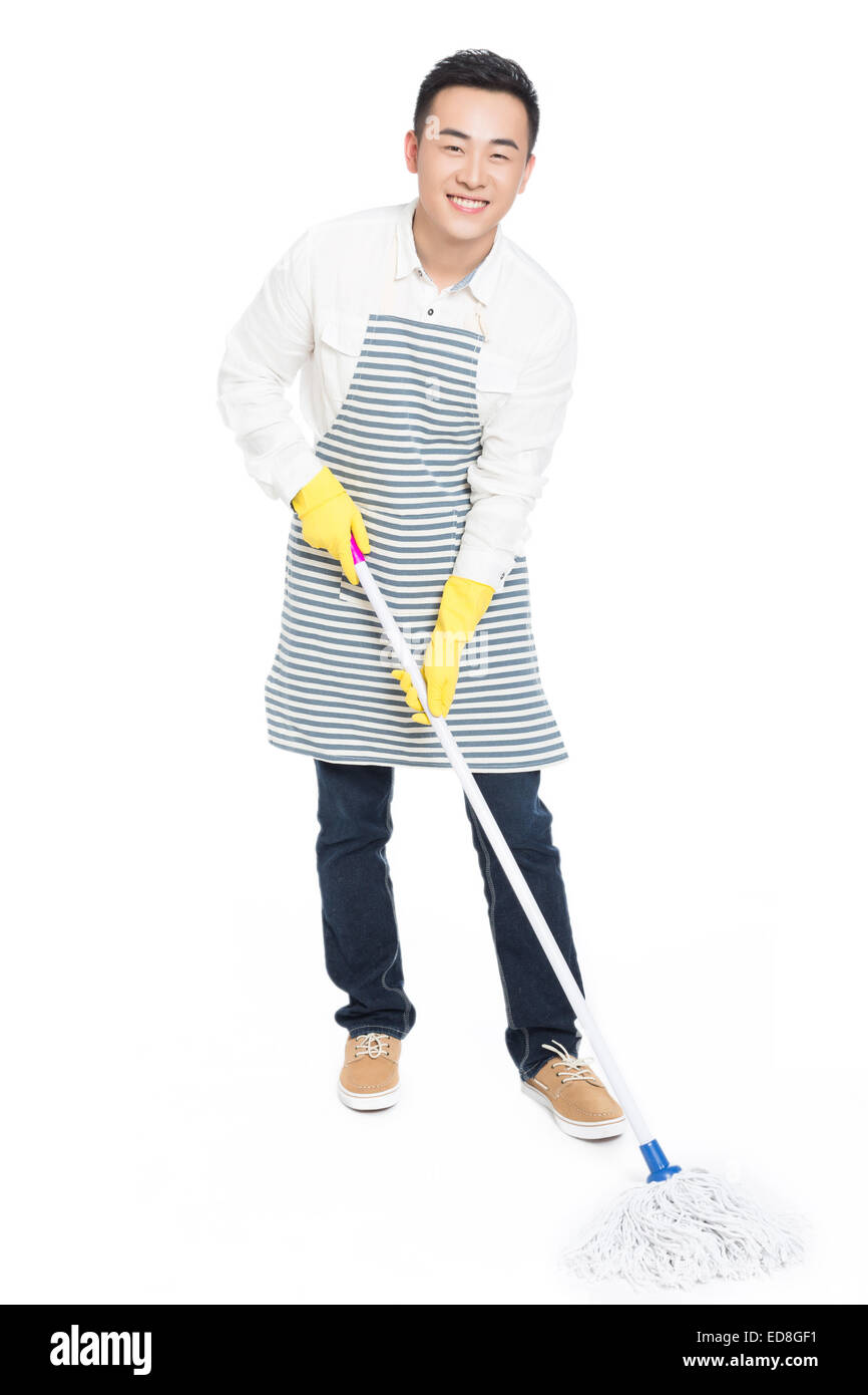 chinese male with cleaning sweep, white background Stock Photo - Alamy