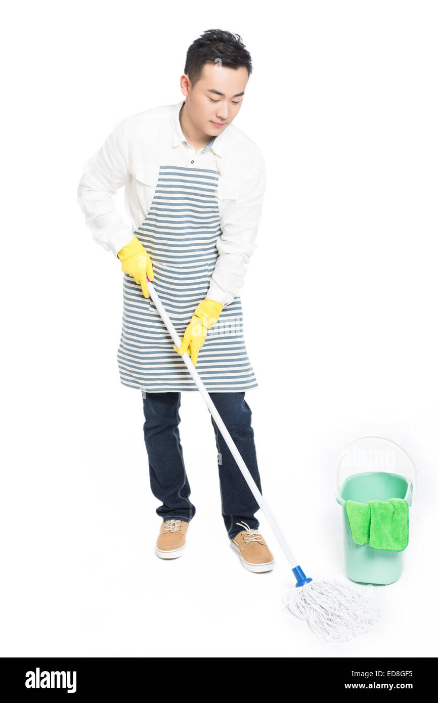 chinese male with cleaning sweep, white background Stock Photo - Alamy