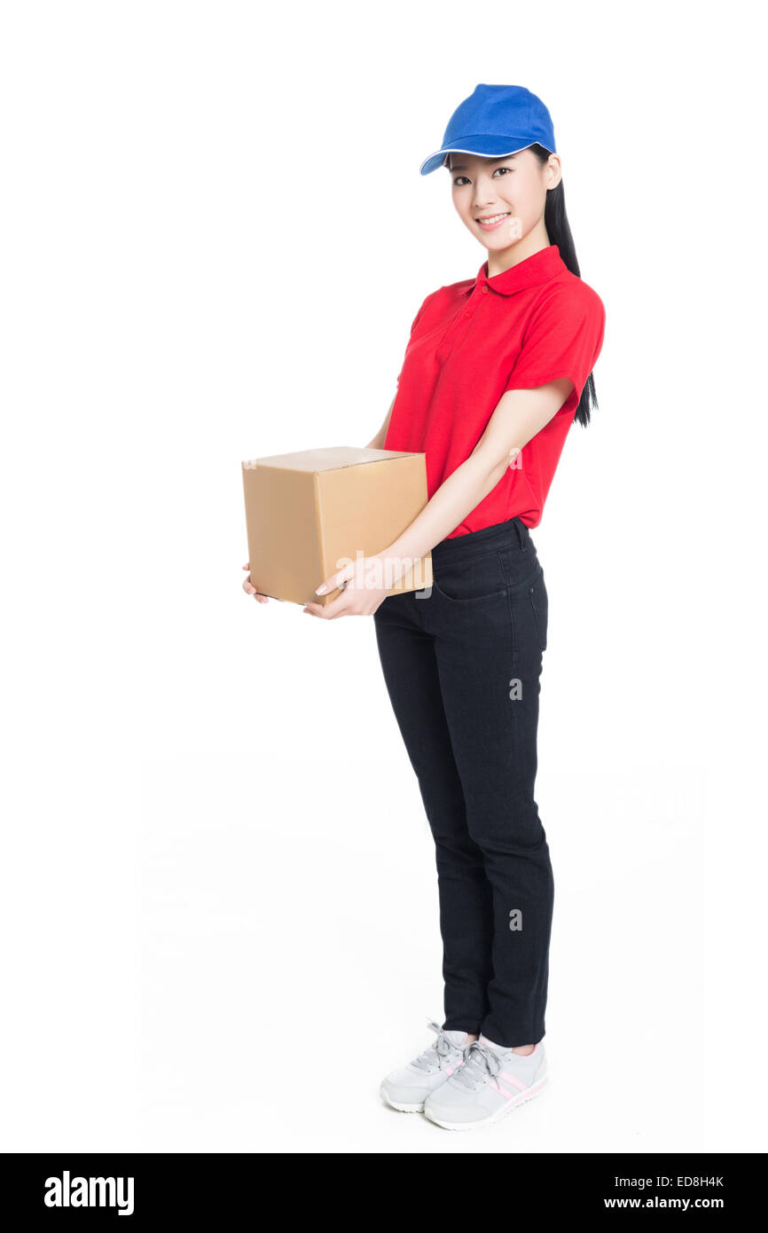delivery woman carrying cardboard box, white background Stock Photo - Alamy