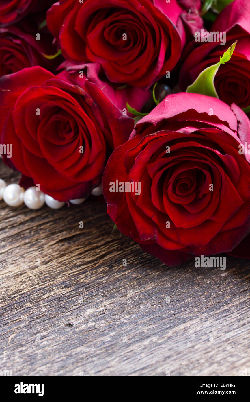 red roses on velvet Stock Photo - Alamy