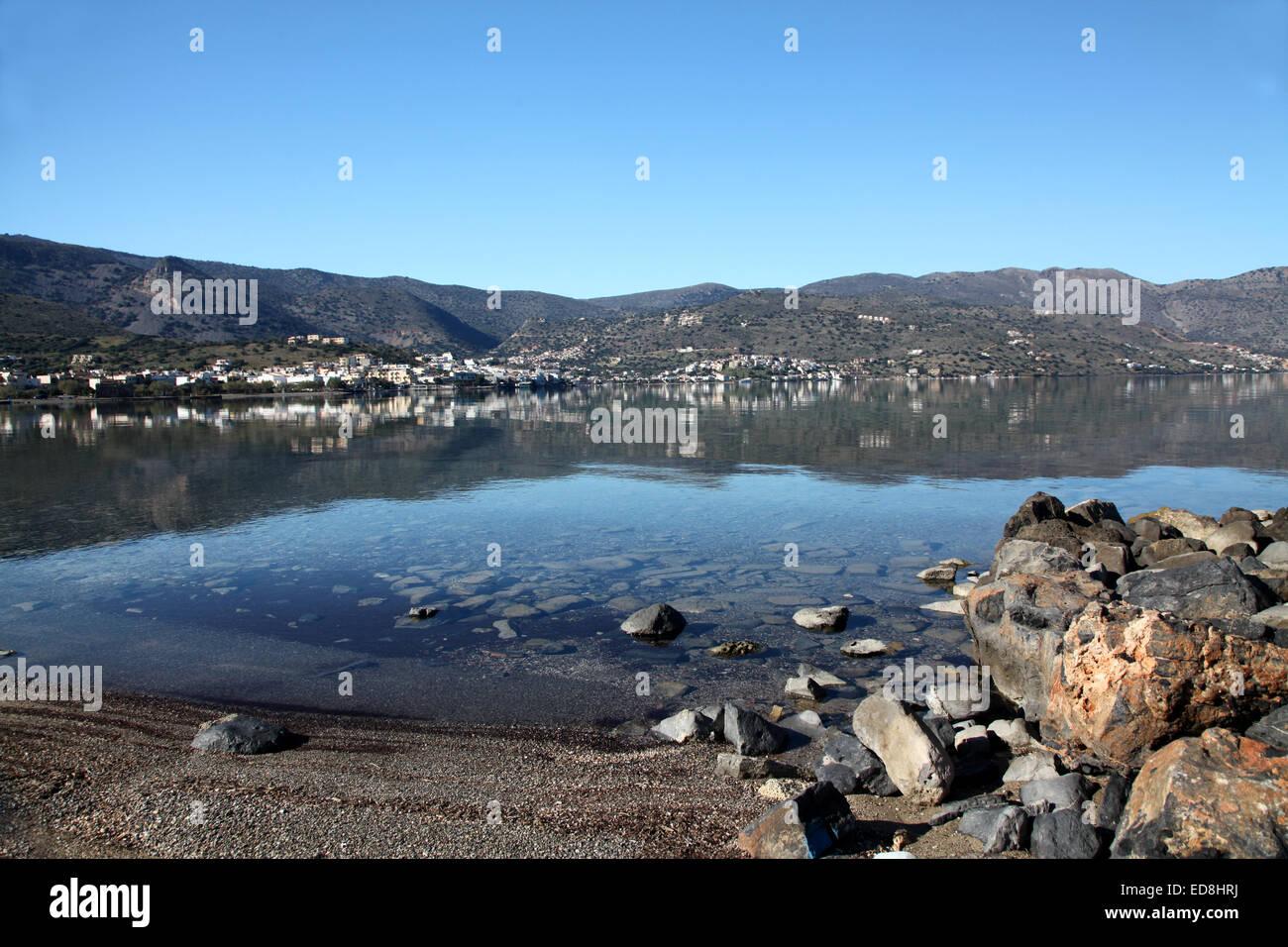 Elounda, Crete looking across the bay from the causeway to the town on ...