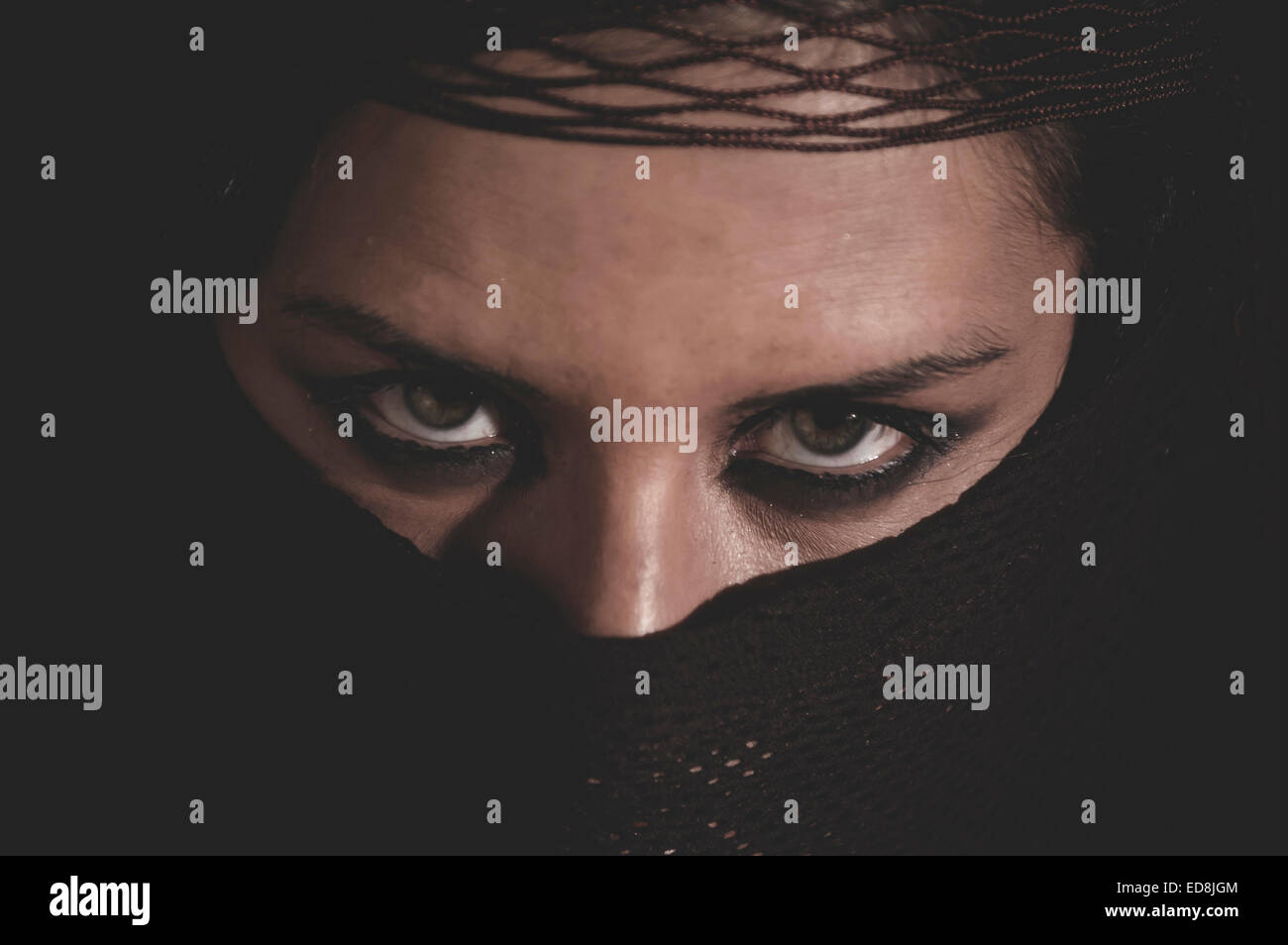 India, woman in traditional Islamic veil, burka, beautiful and deep ...