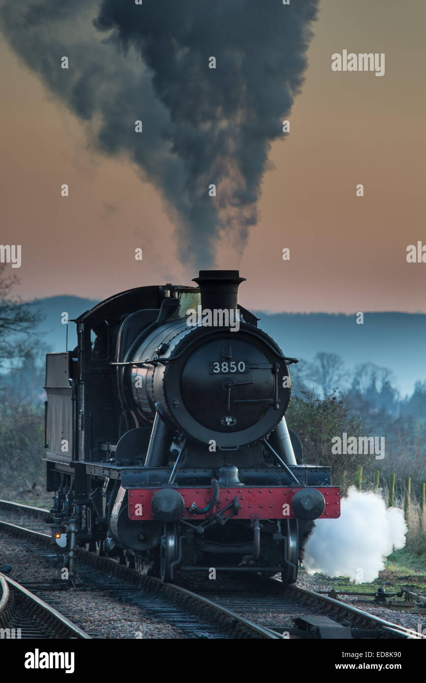 No 3850, GWR 2884 Class 8F steams away while changing ends of the train ...